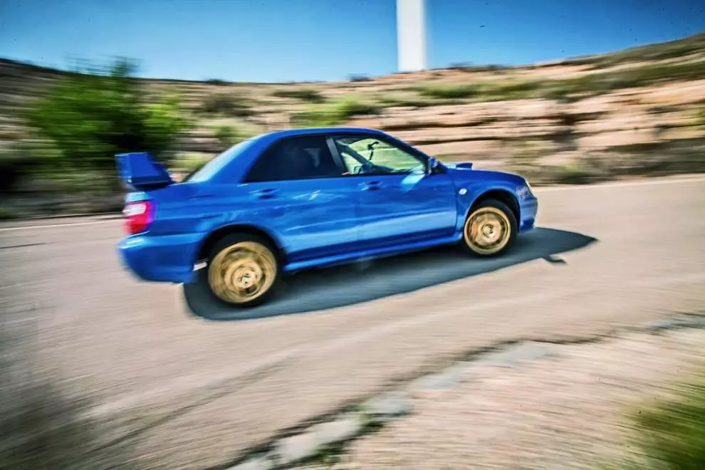 די סובאַרו WRX STI קעגן זיין פּרעדאַסעסערז 25582_6